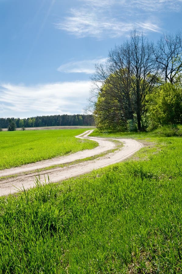 Rural road stock image. Image of clouds, dirt, cloud, green - 2751247