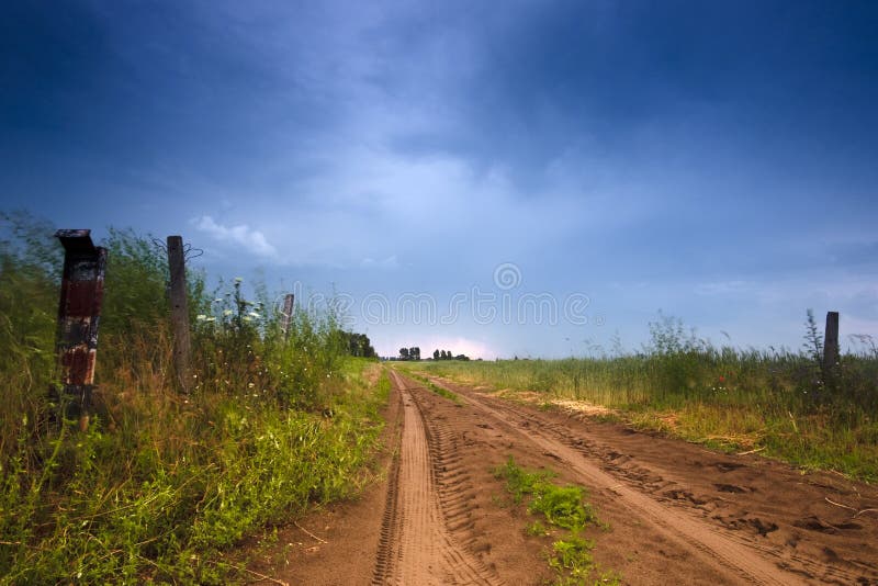 Rural Road and Dark Storm Clouds Stock Image - Image of outside ...