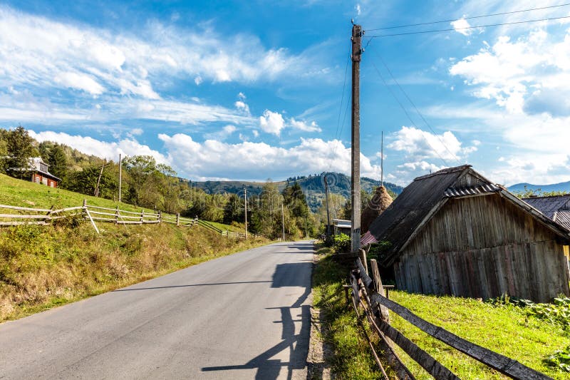 A Rural Road with a House on the Side Stock Photo - Image of ...