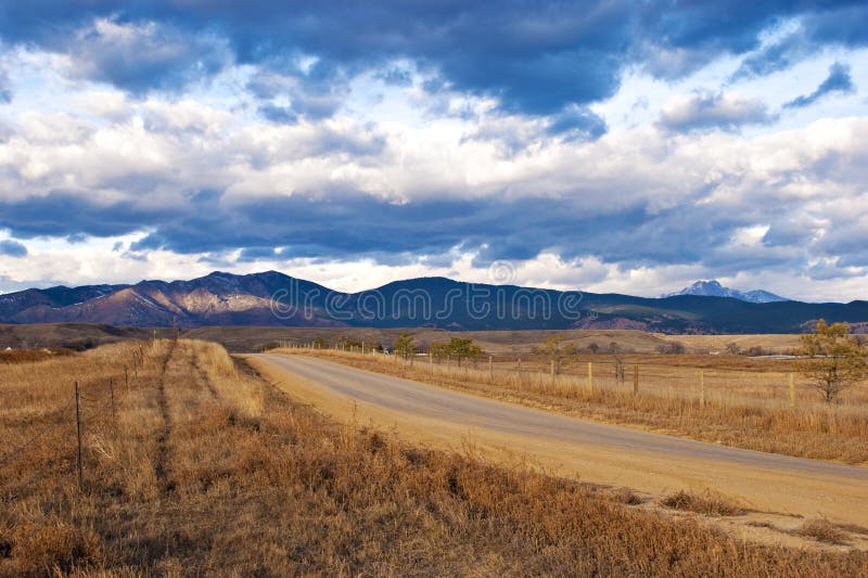 Rural Road Leads Towards a Distant Patch of Light Stock Image - Image ...