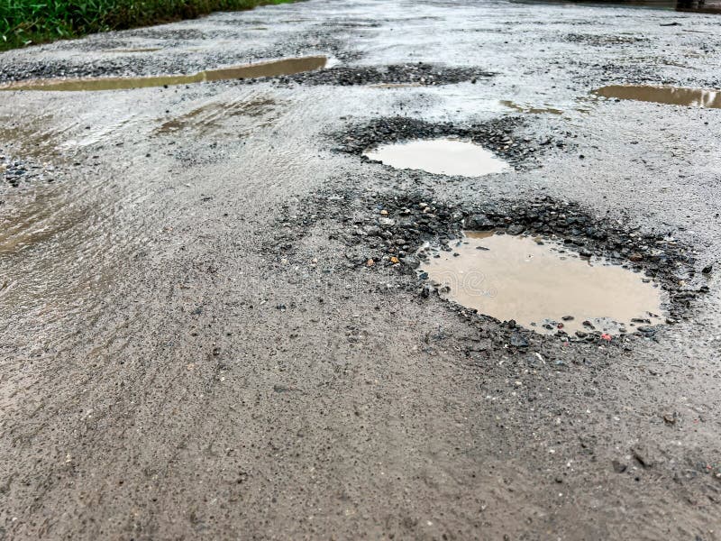 Rural Roads are Bumpy, Waterlogged, and Damaged Stock Image - Image of ...