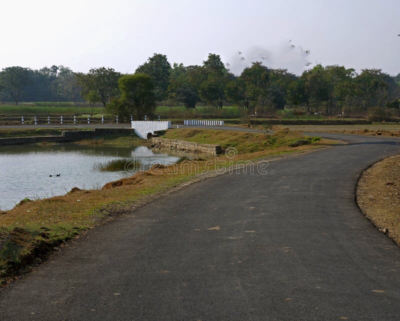 A Rural Village Path or Road with S-curve Stock Photo - Image of side ...