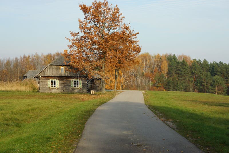 Rural Wooden House in the Green Field with a Pathway Stock Image ...