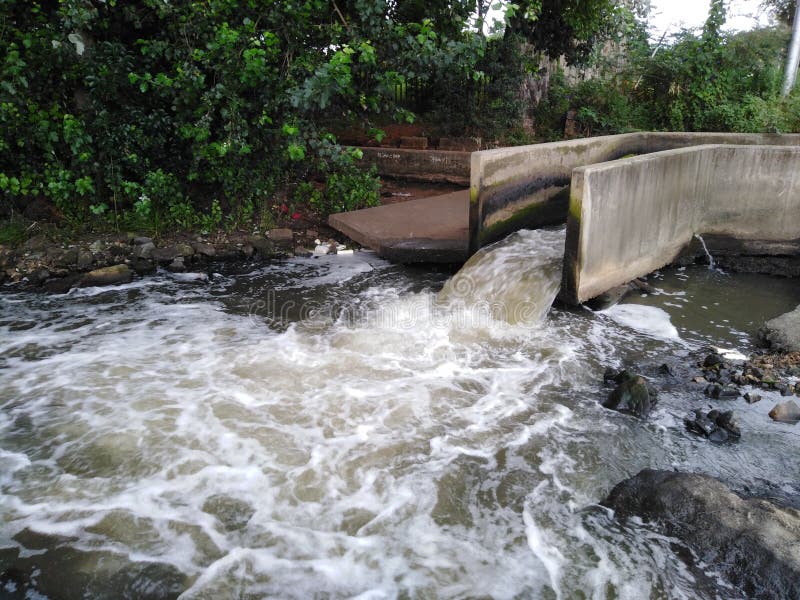 The Rush of Water Off the Streets into the Rapids from the Storm ...