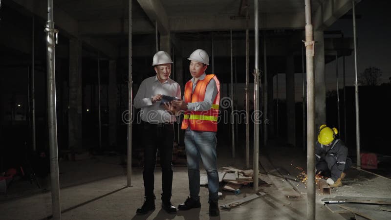 In Rush Work Overtime, Engineers and Architects are Consulting on a ...