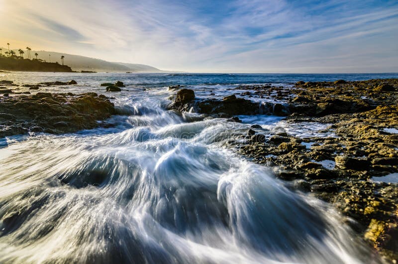 Rushing Water and Clouds in Laguna Beach, CA Stock Image - Image of ...