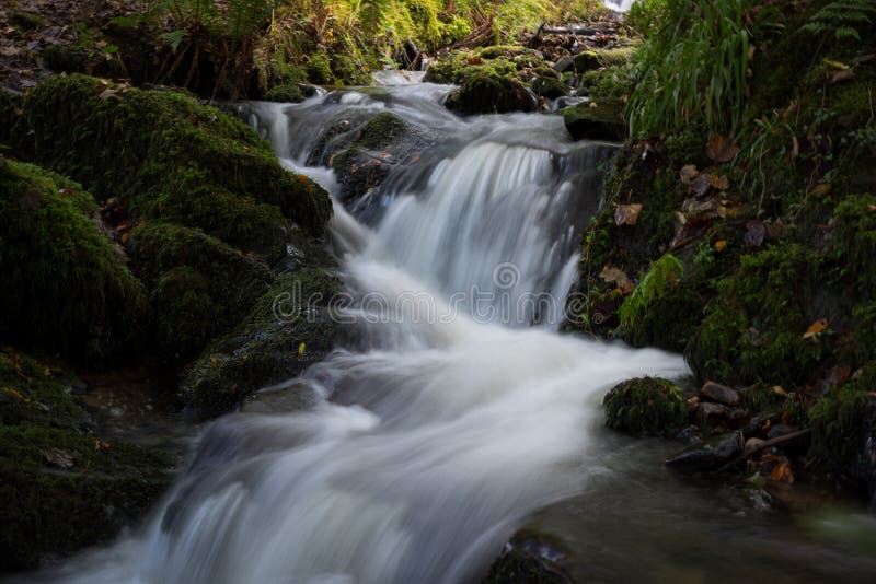 Rushing Water Over Rocks in a Natural Setting Stock Photo - Image of ...
