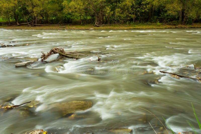 Rushing water on a river stock photo. Image of afternoon - 35464314