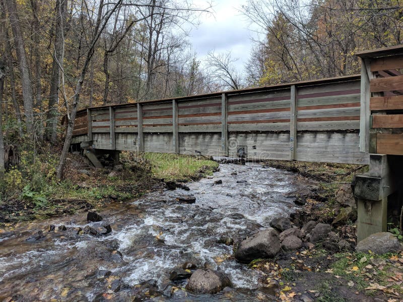 Rushing Water Under The Bridge Stock Image - Image of spring, nature ...