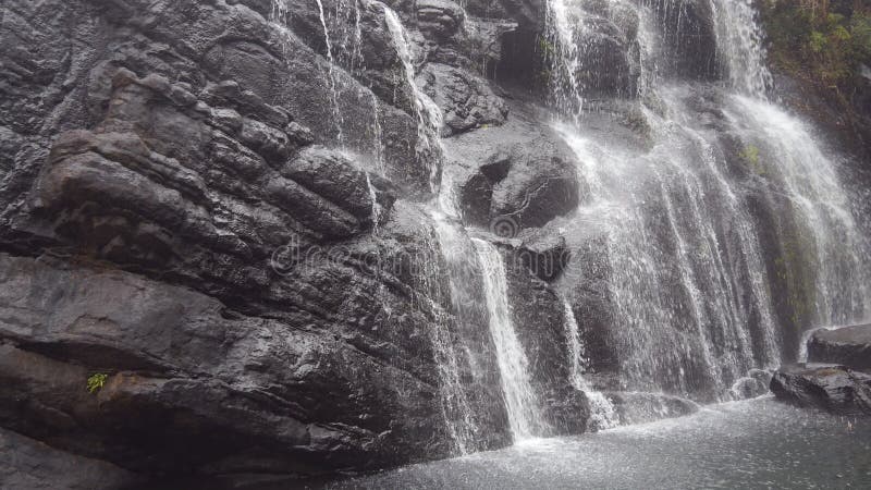Rushing Waterfall in the Mountains with Tropical Forest. Beautiful ...
