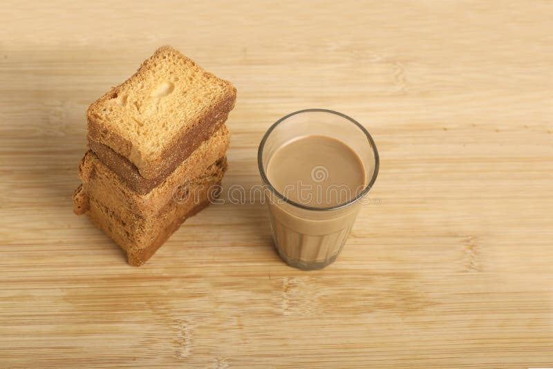 Rusk with Cup of Tea with Wood Background Stock Image - Image of indian ...
