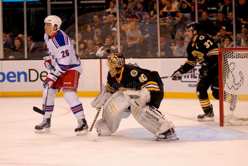 Tuukka Rask makes a save editorial stock image. Image of puck - 22373639
