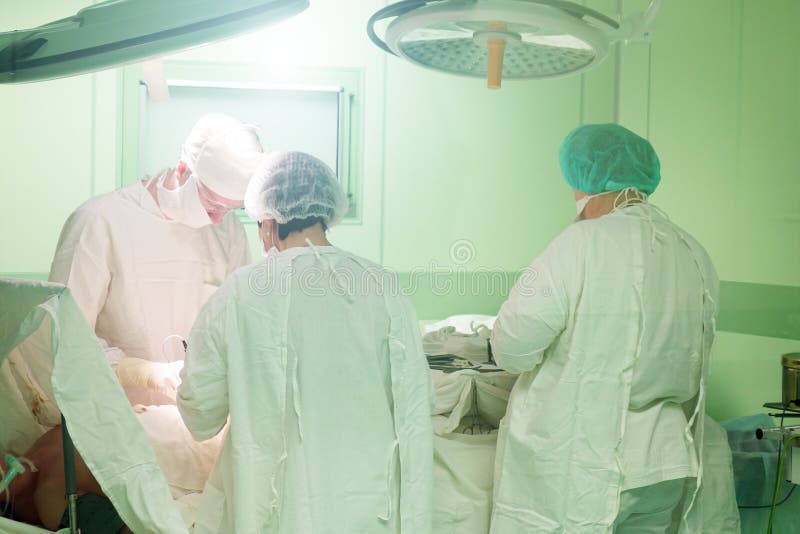 Surgeons Perform the Operation in the Surgery. Stock Image - Image of ...