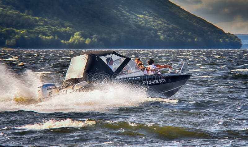 RUSSIA, SAMARA - JULY 28, 2019: Motor Boat Silver Hawk Floating on the ...