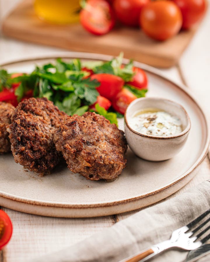 Russian Beef Cutlets with Sauce and Salad Stock Image - Image of ...
