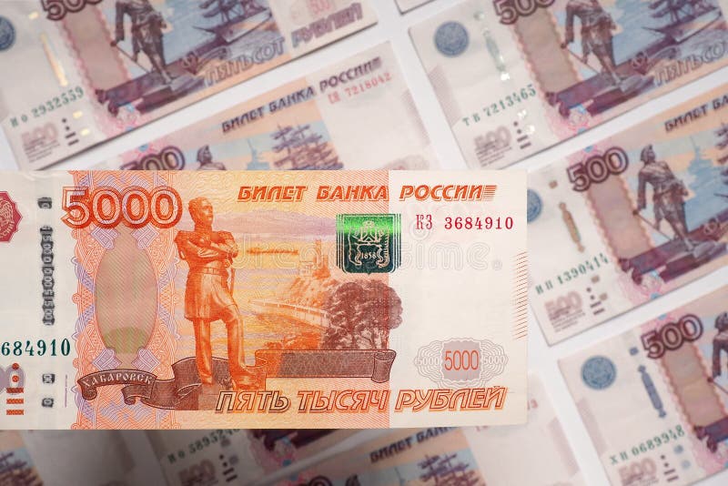 The Russian Bill of 5000 Rubles Hangs Over a Field of 500 Ruble ...