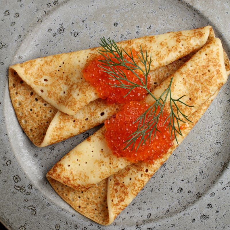 Blinis with Red Caviar and Sour Cream Decorated with Green Onion Stock ...