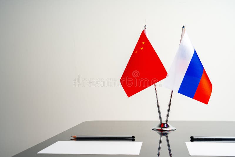 Russian and Chinese Flags on Negotiation Table Close Up Stock Photo ...