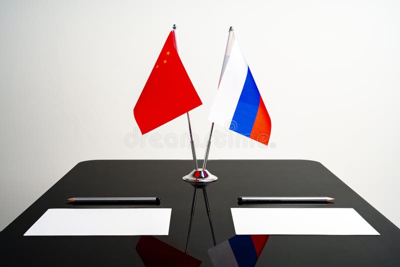 Russian and Chinese Flags on Negotiation Table Close Up Stock ...