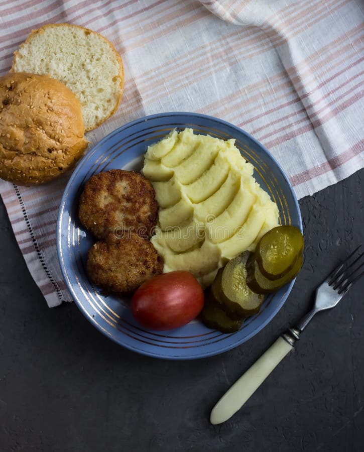 Russian Cuisines: Mashed Potatoes, Pork Chop, Pickled Vegetables Stock ...
