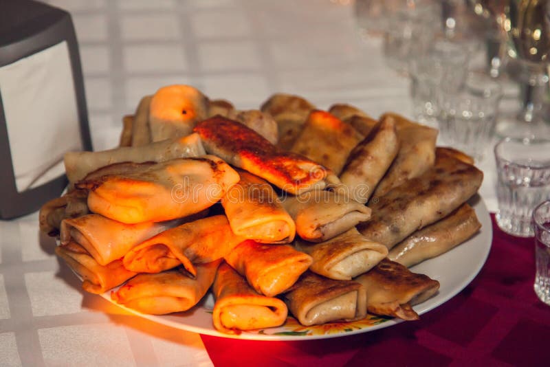 Russian Feast. a Table Set with Russian Snacks: Pancakes Bliny with ...