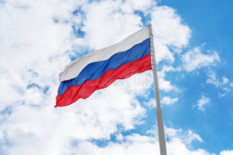 Russian Flag in Front of Blue Sky and Clouds Stock Image - Image of ...
