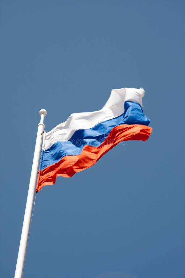 Russian Flag on a Pole Against Blue Sky Stock Photo - Image of white ...