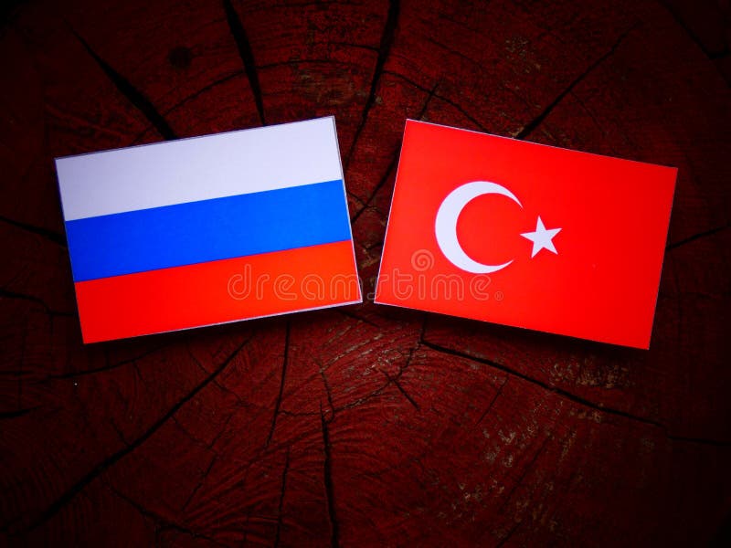 Russian Flag with Turkish Flag on a Tree Stump Stock Photo - Image of ...