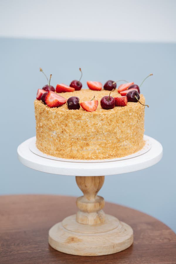 Russian Honey Cake on Elevated Plate Decorated with Berries Stock Photo ...