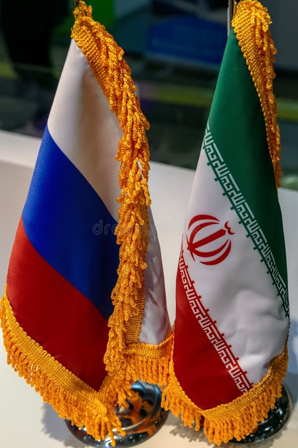 Russian and Iranian Flags on the Table. the Concept of Bilateral ...