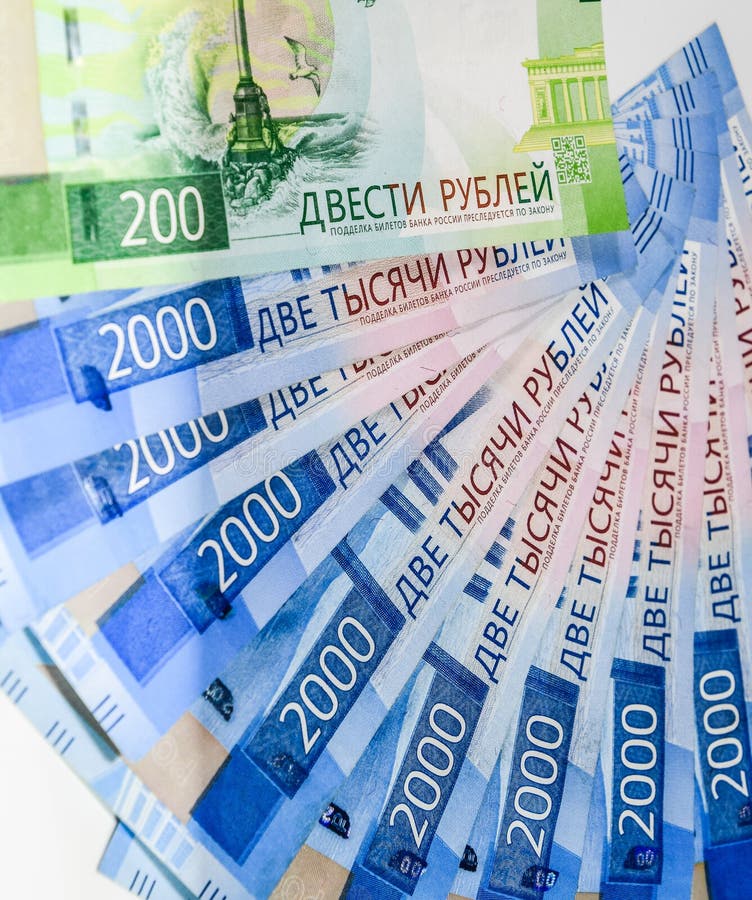 Russian Banknotes And Coins. A Handful Of Coins On New Russian ...