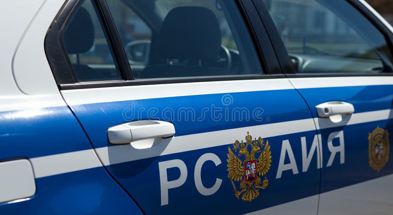Russian Police Car Side View with Eagle Emblem and Blue Stripe Stock ...