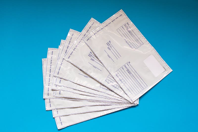Russian Post Polyethylene Envelope on Blue Background. Plastic Postal ...