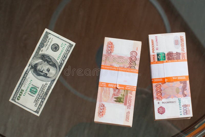 The Russian Ruble and the US Dollar Stock Photo - Image of curved ...