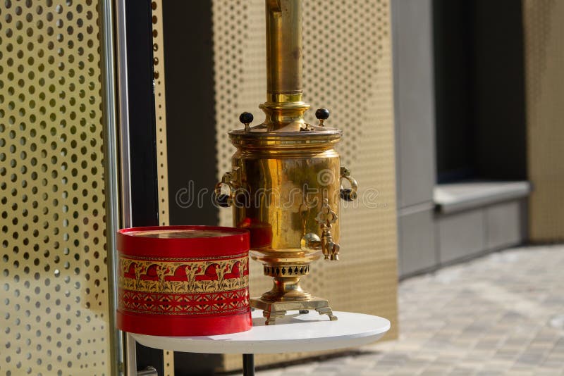 A Russian Samovar Stands on a Table in Front of the Cafe. Shining on ...