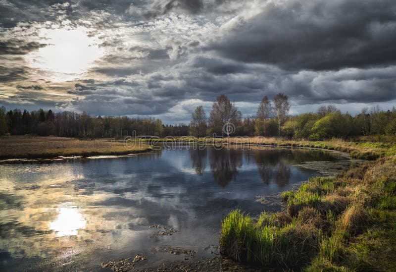 Russian Spring Landscape with Sun and Reflections of Trees in the Lake ...
