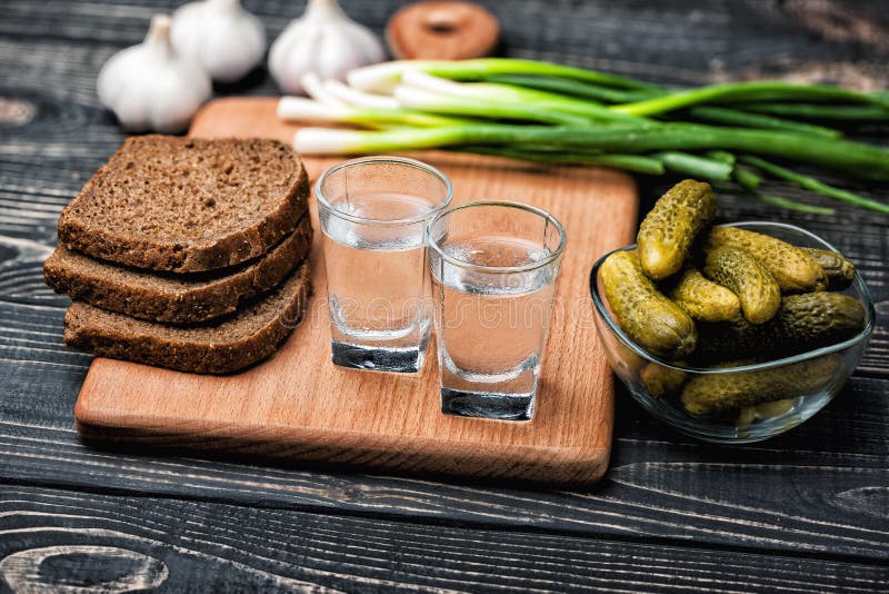 Russian Vodka with Traditional Black Bread and Pickles Stock Photo ...