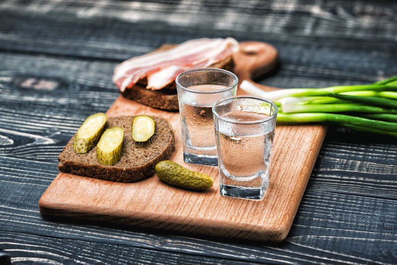 Russian Vodka with Traditional Black Bread and Pickles Stock Image ...