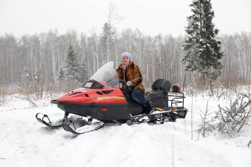 Russian Woman Driving Snowmobile Stock Image - Image of riding ...