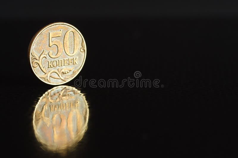 Russian Coin 50 Kopeck on the Edge on Black Background with Reflection ...