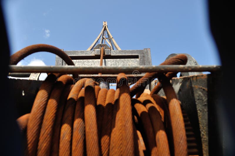 Rust ropes by the sea stock image. Image of abstract - 194809877