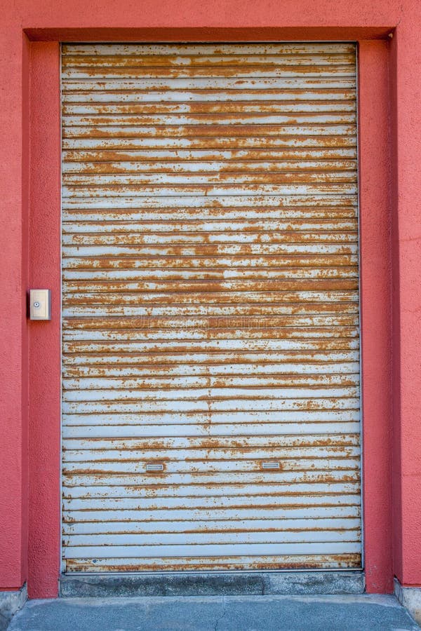 The Rust Corrugated Grey Metal Door. Stock Image - Image of plate ...