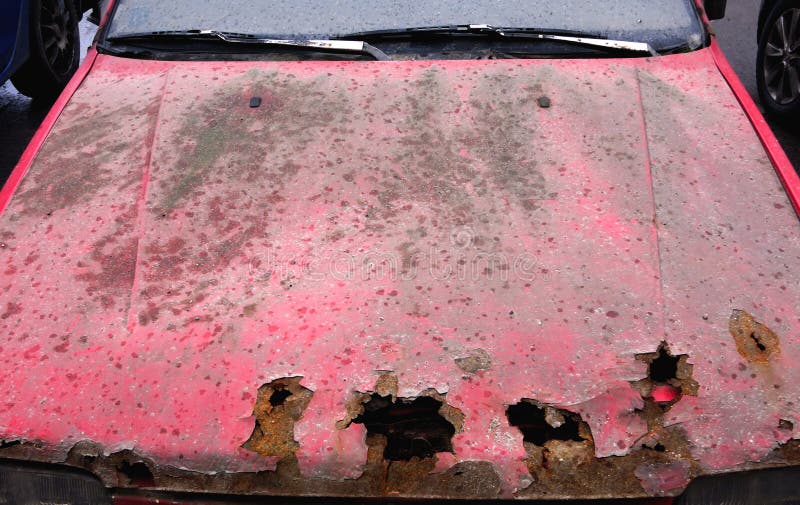 Rust in the Hood of a Red Car Stock Photo - Image of iron, rust: 211482470