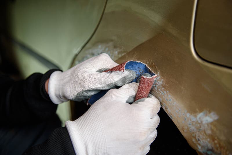 Rust. Removing Rust with Sandpaper Stock Photo - Image of mechanic ...