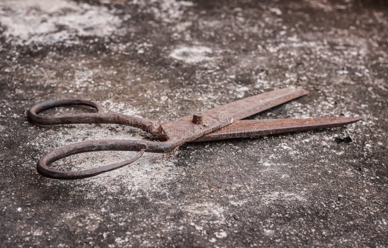 Old Rust Scissors on Black Stone Table Stock Photo - Image of boarder ...