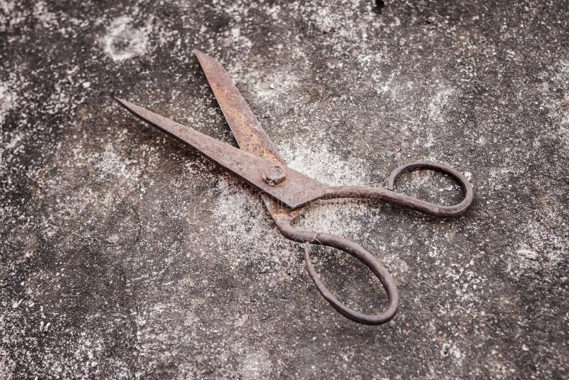 Old Rust Scissors on Black Stone Table Stock Photo - Image of boarder ...