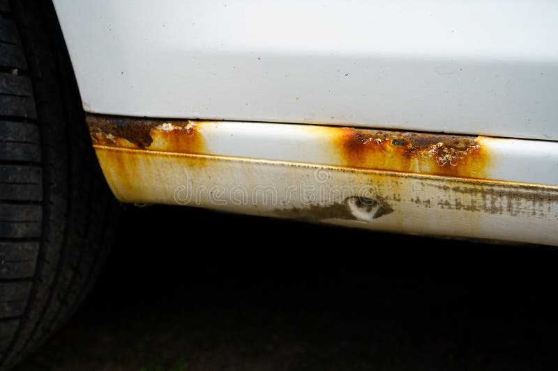 Rust Spots on the Side of a White Vehicle Outdoors Stock Photo - Image ...