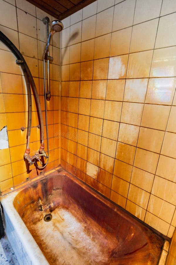 Rust Stains in Bathtub on Wall and Bath. High Level Iron Dissolved in a ...