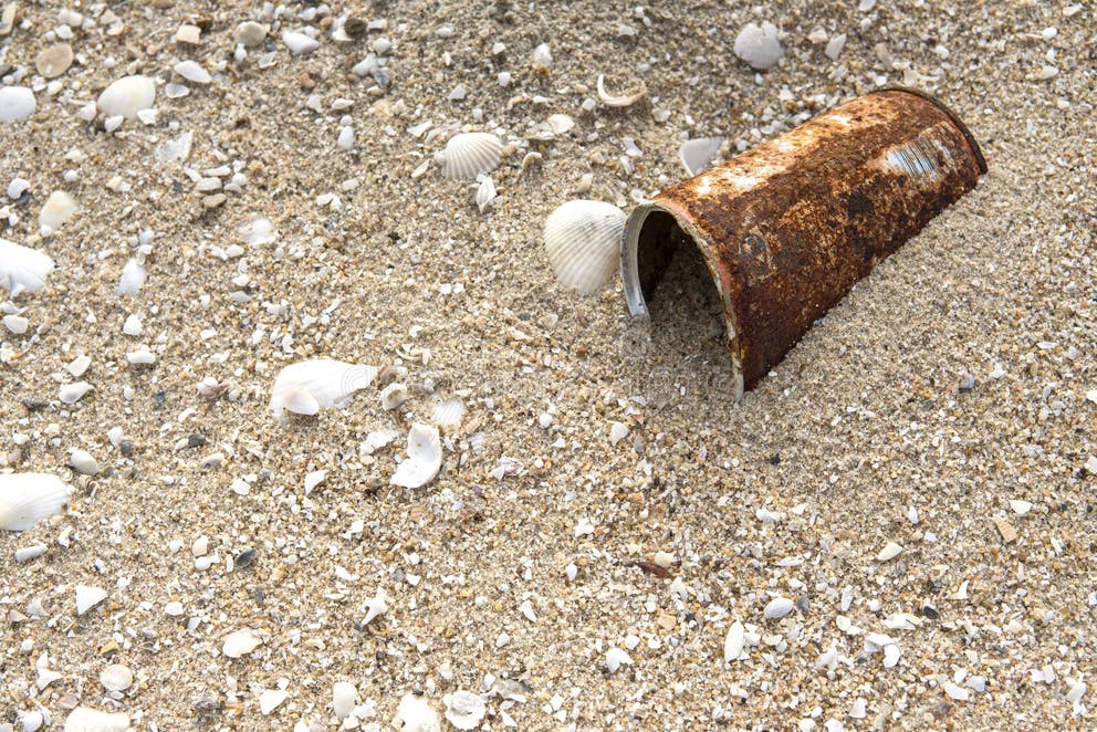 Rust Tin Can on the Beach. Garbage on the Beach Stock Photo - Image of ...