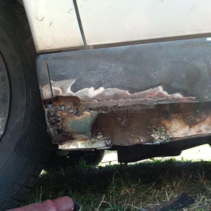 Rust on the vehicle body stock image. Image of street - 287264857